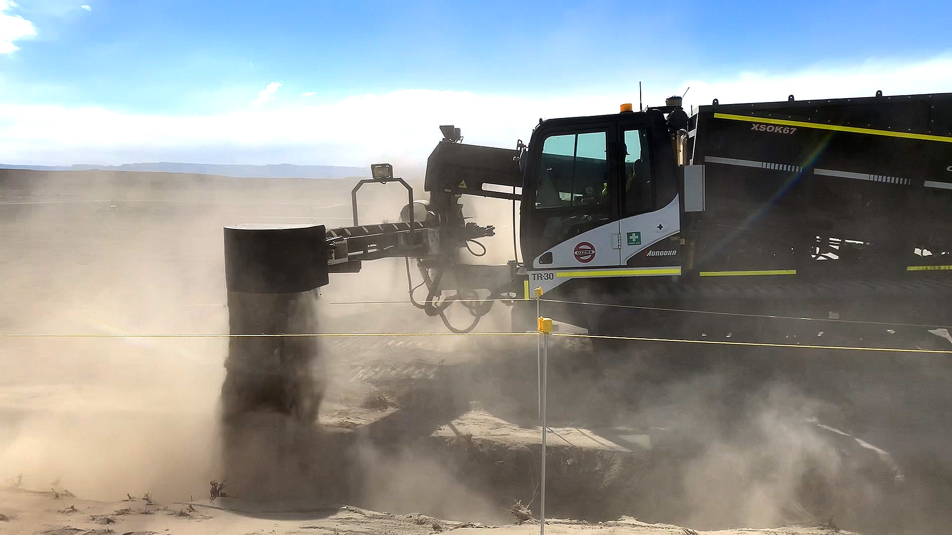 Backfill from a distance with Ozzies Slinger Truck